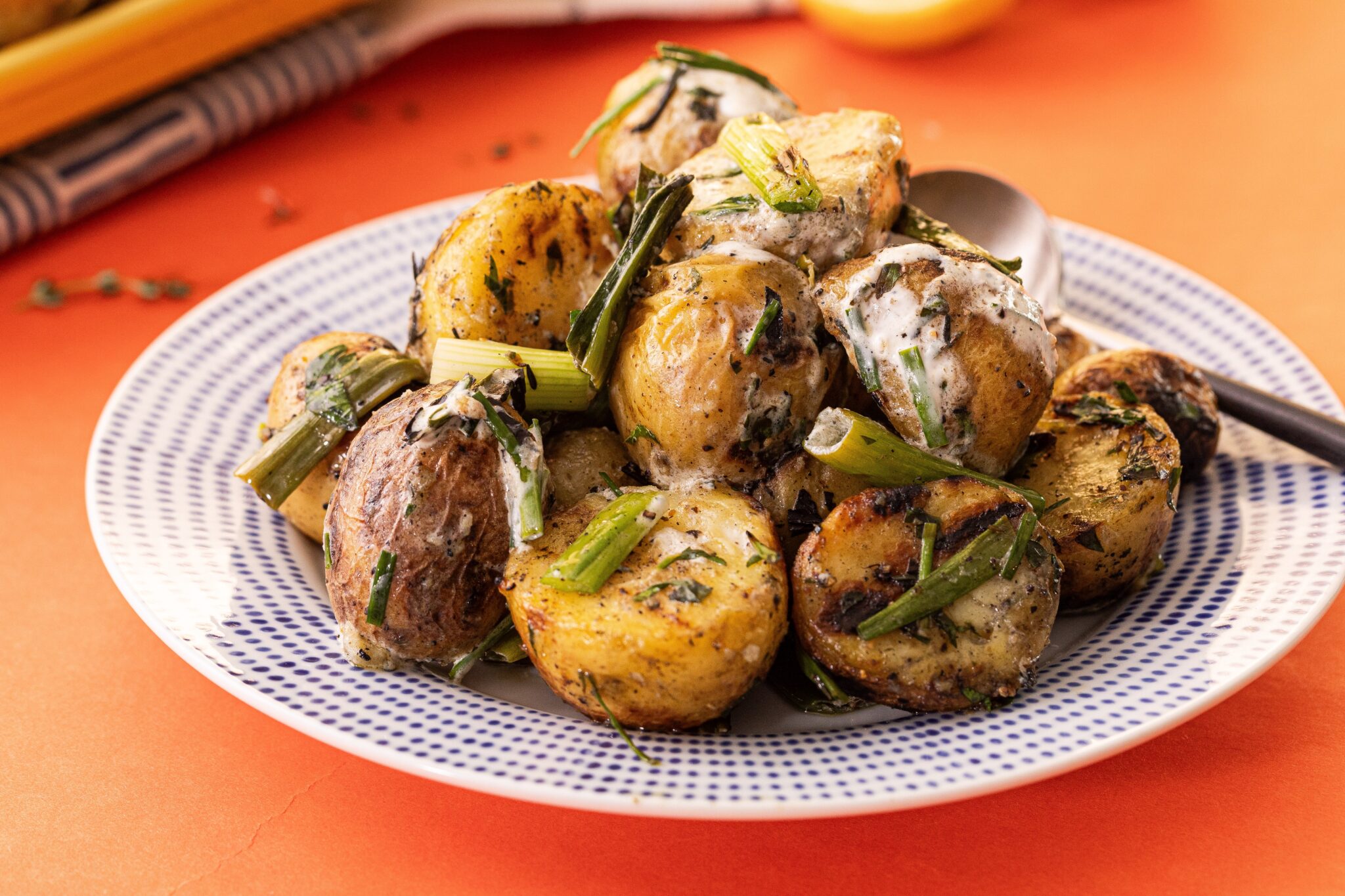 Grilled Herby Potatoes with Charred Scallions - Lakewinds Food Co-op